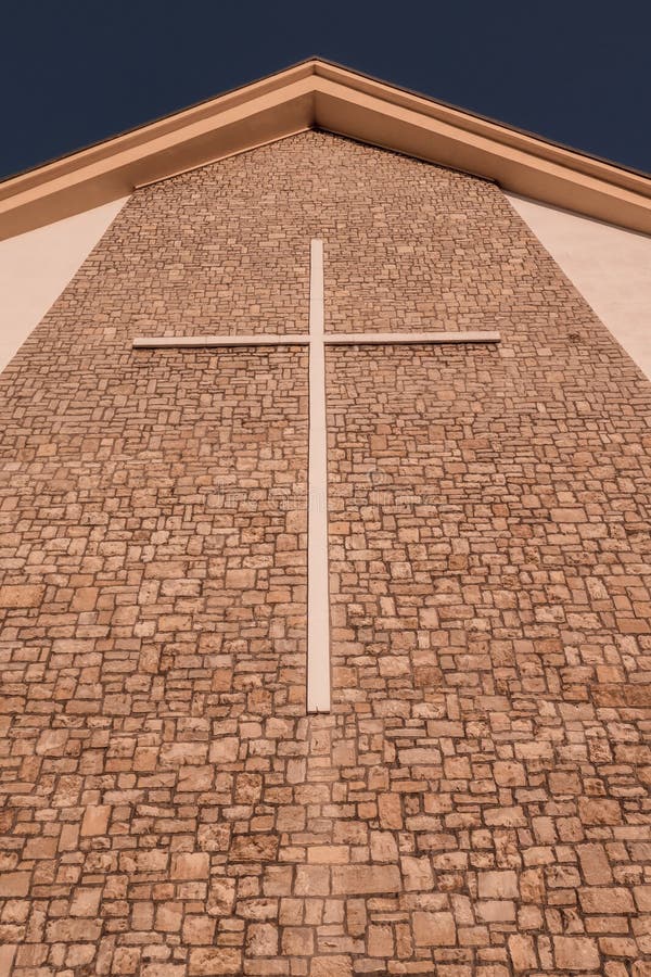 Vertical Low-angle Closeup of a Stone Wall of a Church with a Huge ...