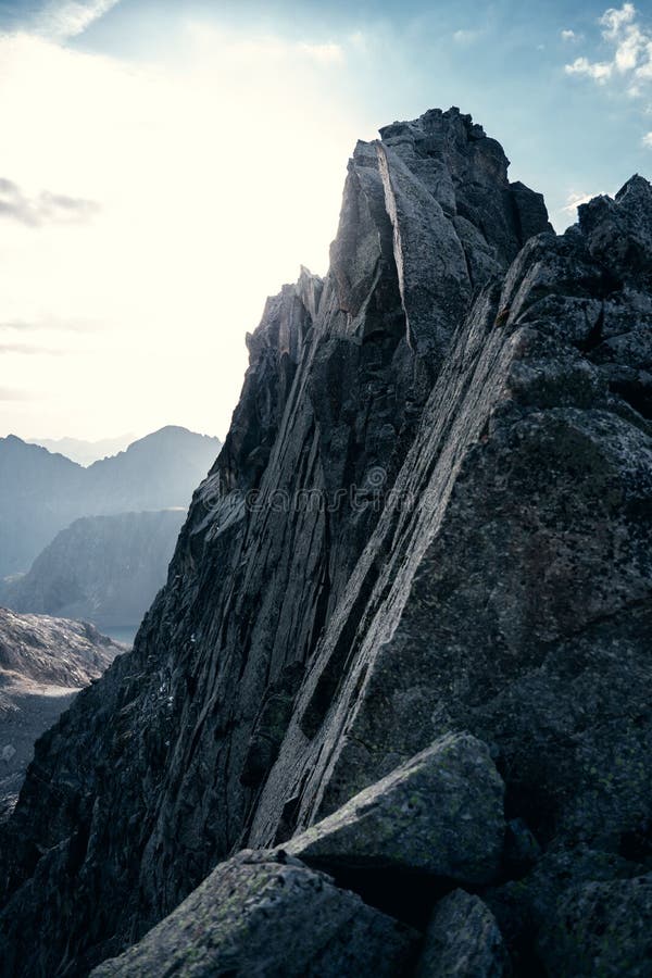 Vertical Low Angle of a Rugged, Rocky Mountain Captured on Against the ...