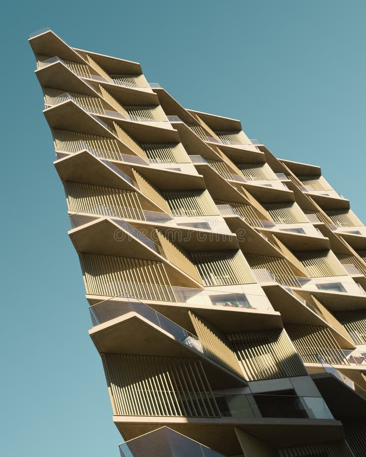 Vertical Low Angle Shot of a Beige Metal Building Under the Blue Sky ...