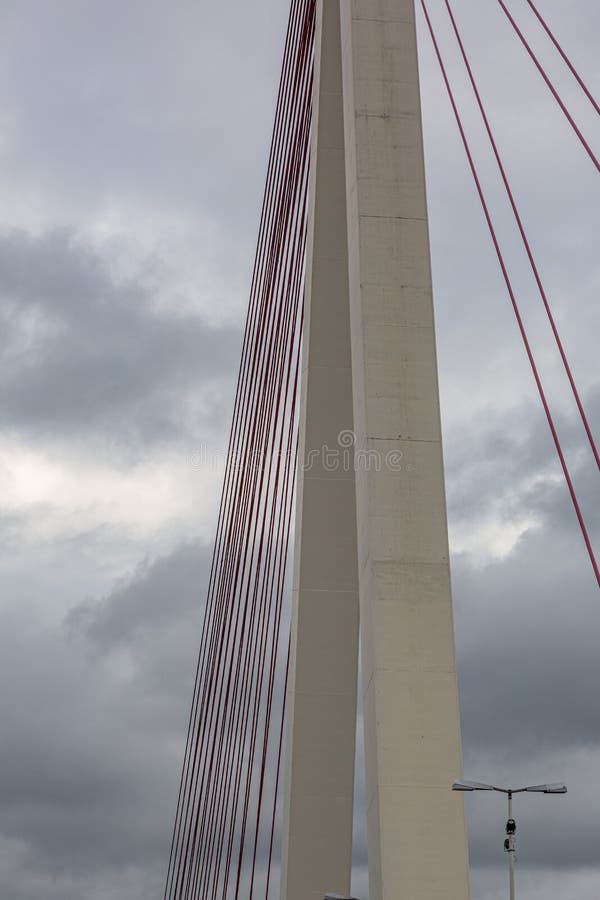 Vertical Low Angle Shot of a Cable-stayed Bridge on a Cloudy Sky ...