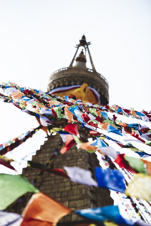 Vertical Low Angle Shot of Cloth Attached To a String at a Temple in ...