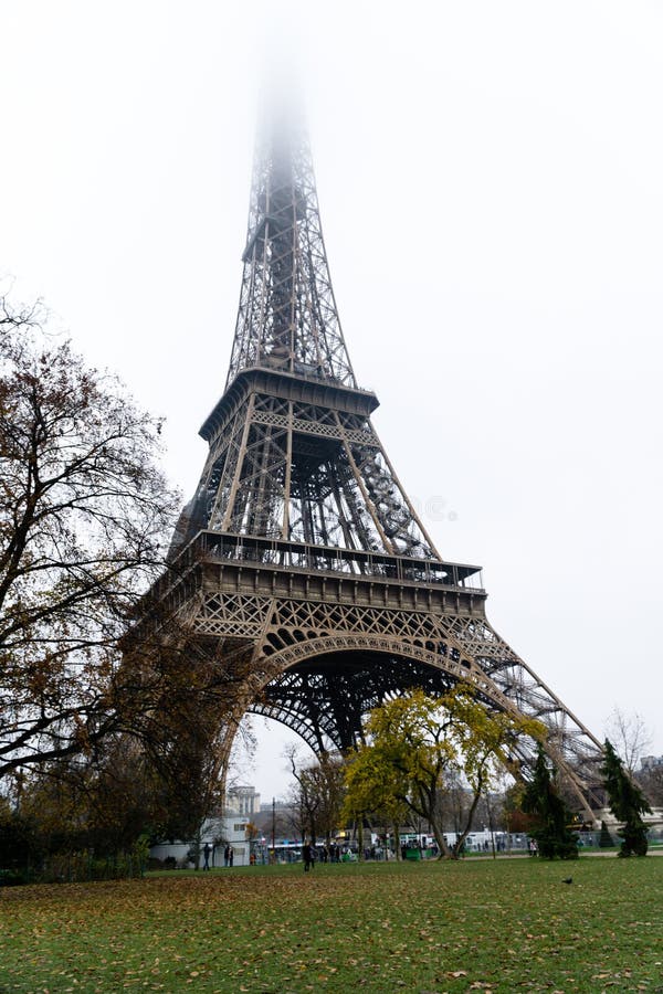 Vertical Low Angle Shot of the Eiffel Tower on a Foggy Day Stock Image ... Vertical Low Angle Shot of the Eiffel Tower on a Foggy Day Stock Image ...