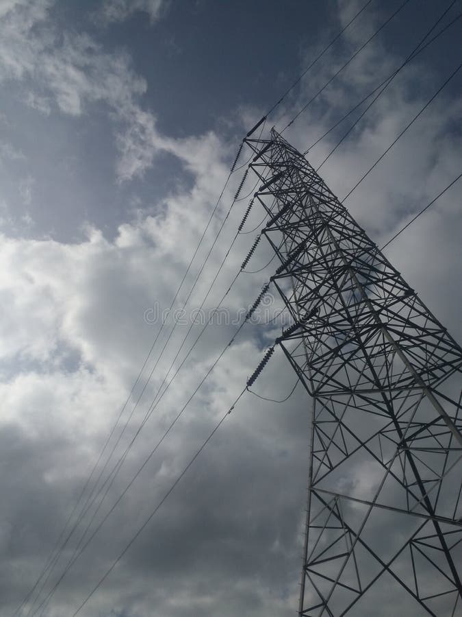 Vertical Low Angle Shot of an Electric Pole Under Cloudy Sky Stock ...