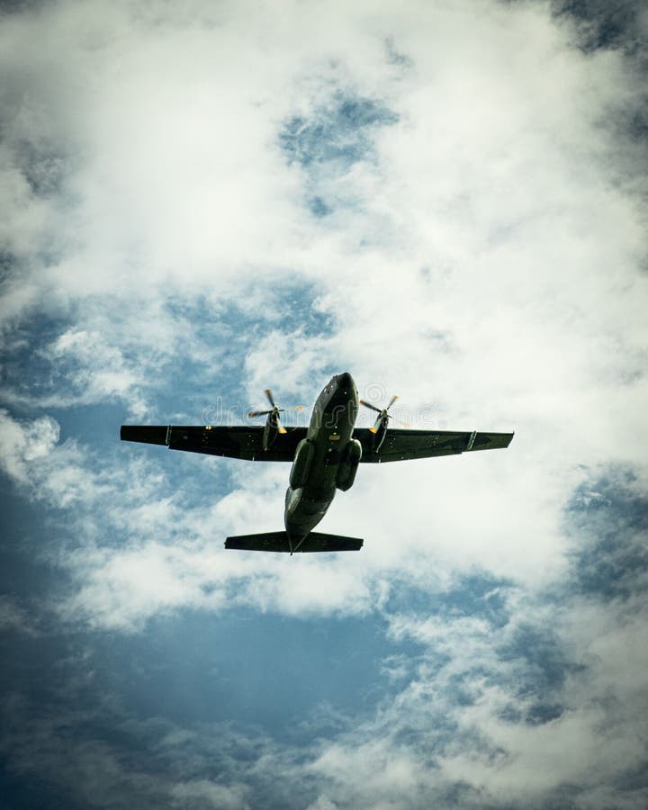 Vertical Low Angle Shot of a Flying Airplane Stock Image - Image of ...