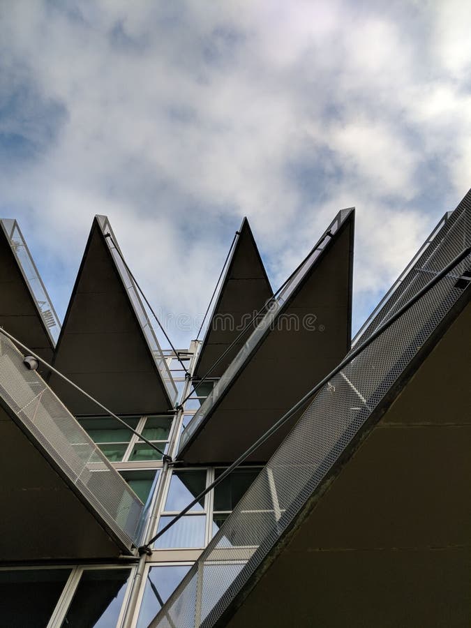 Vertical Low Angle Shot of a High Rise Building with Triangular ...