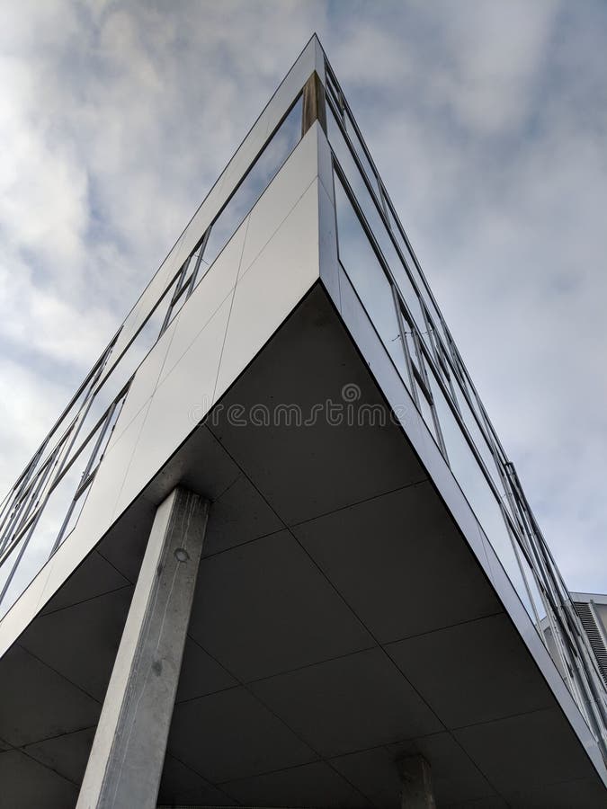 Vertical Low Angle Shot of a High Rise Triangular Building Stock Image ...