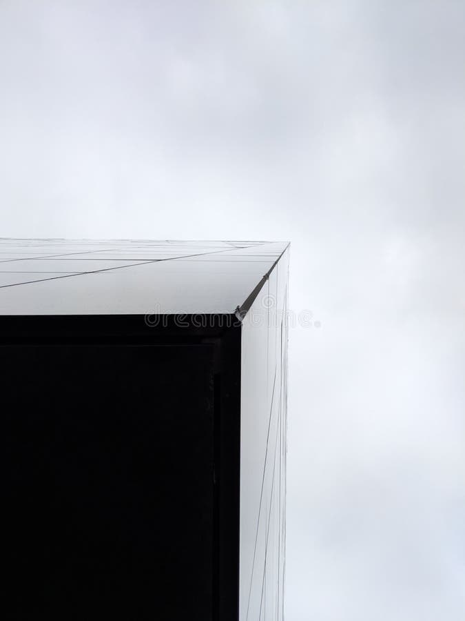 Vertical Low Angle Shot of a High Rise Triangular Building Stock Photo ...