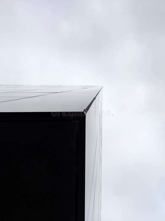 Vertical Low Angle Shot of a High Rise Triangular Building Stock Photo ...