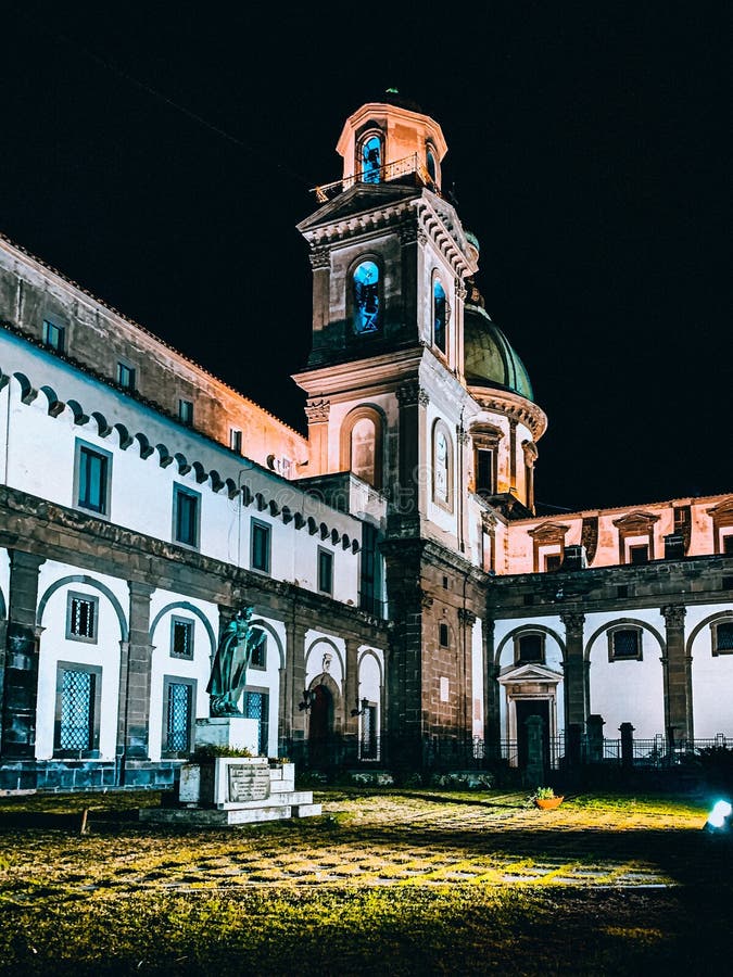 Vertical Low Angle Shot of a Historical Stone Building with a Tower on ...