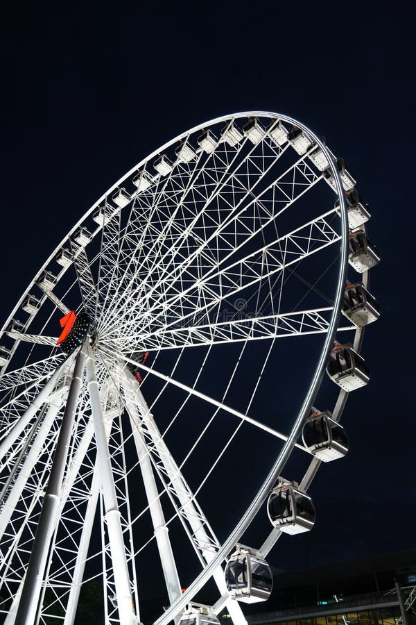 Vertical Low Angle Shot of an Illuminated Ferris Wheel in Brisbane ...