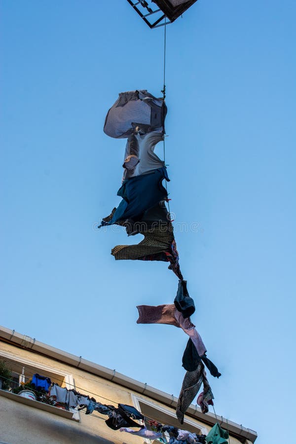 Vertical Low Angle Shot of Laundry Hanging Outdoors Stock Photo - Image ...