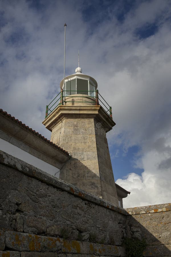 Vertical Low Angle Shot of Louro Lighthouse in Galicia, Spain Under ...