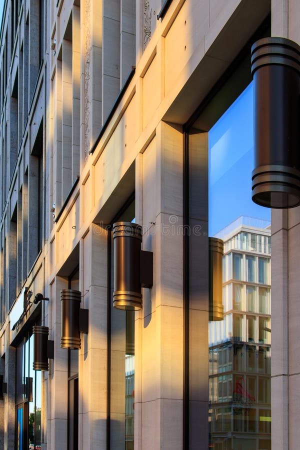 Vertical Low Angle Shot of the Lower Part of a Brown Building with See ...