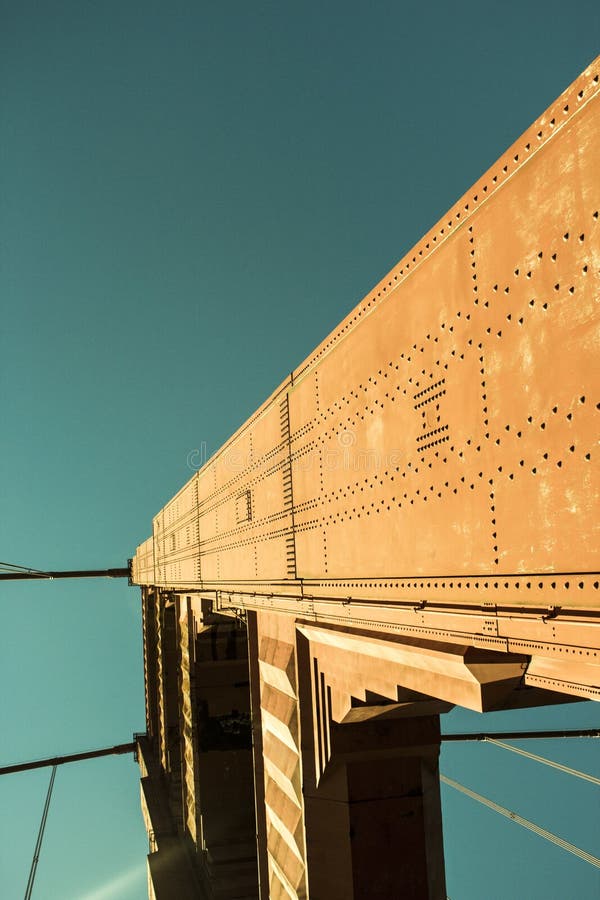 Vertical Low Angle Shot of the Magnificent Metal Columns of a Bridge ...