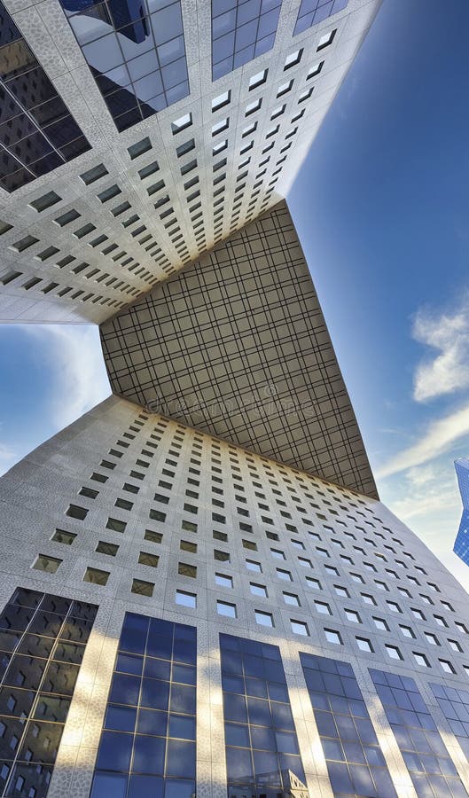 Vertical Low Angle Shot of a Modern Office Building Stock Photo - Image ...