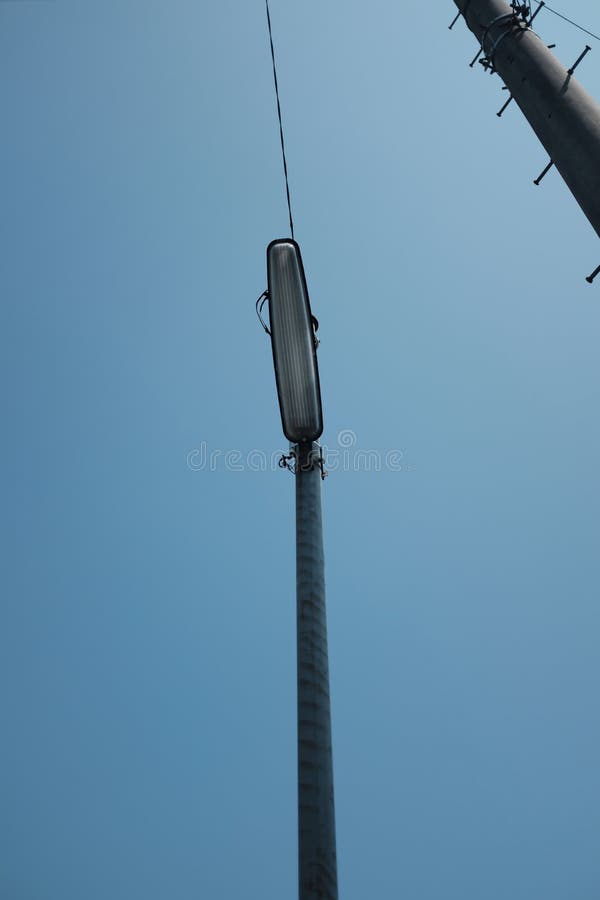 Vertical Low Angle Shot of a Street Light Pole Under a Blue Sky Stock ...