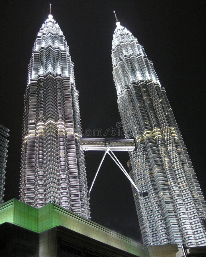 Vertical Low Angle Shot of Two Beautiful Lighted Towers at Night Stock ...