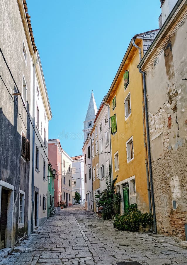 Vertical Low Angle Shot of an Urban Alleyway Stock Photo - Image of ...