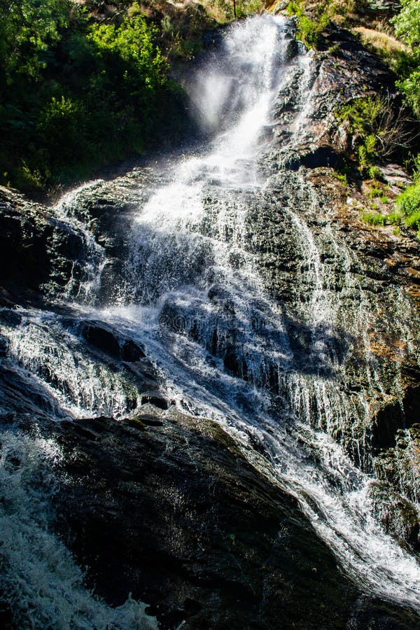 Vertical Low Angle Shot of a Waterfall Captured during the Daytime ...