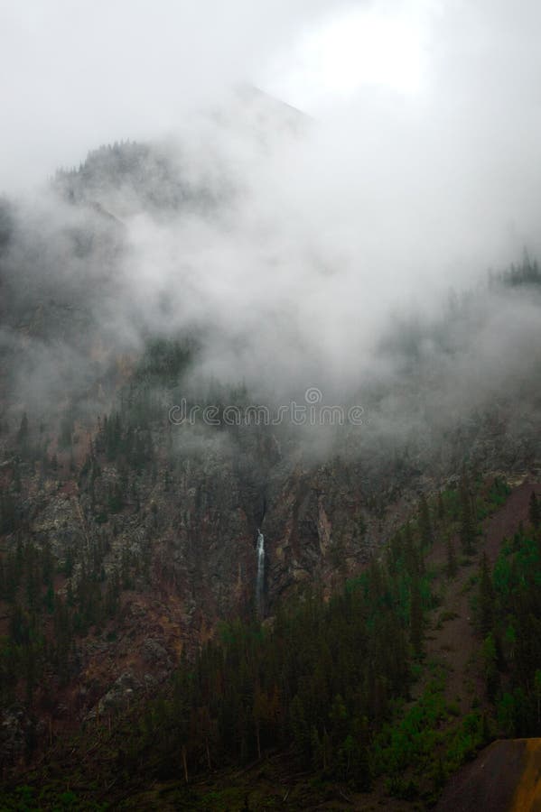 Vertical Low-angle of a Small Waterfall on the Large Mountainside ...