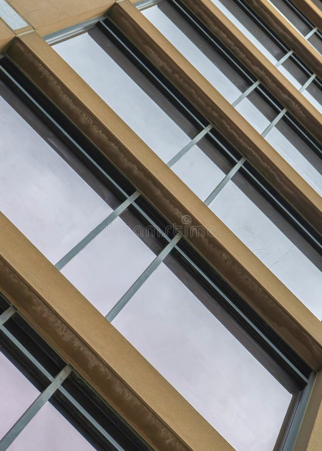 Vertical Tinted Glass Curtain Wall of a Building with Vertical Glass ...