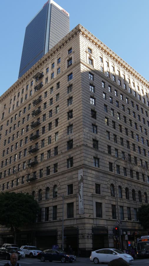 Vertical Low-angle View of a Building Rising Against the Blue Sky in ...