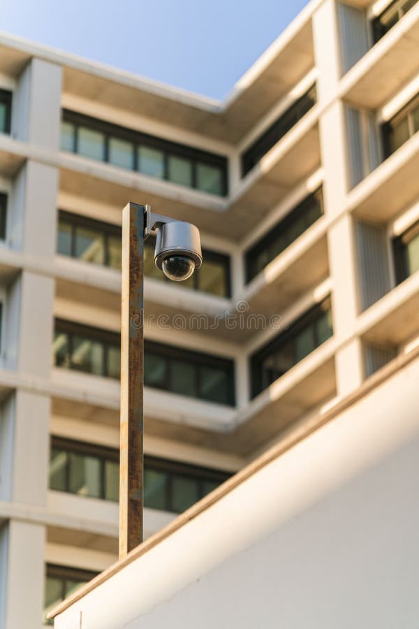 Vertical Low-angle View of a Security Camera Column by a Residential ...