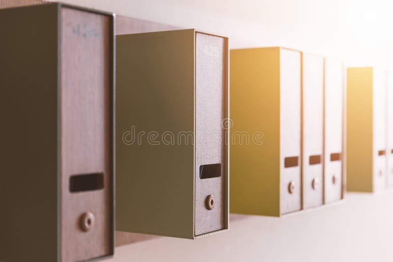 Vertical Mailboxes on Wall with Sunlight Stock Photo - Image of bright ...