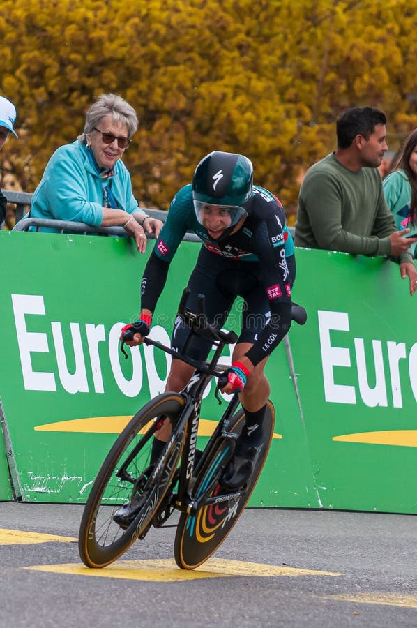 Vertical of a Man Riding a Bicycle Down a Lane during a Competition ...