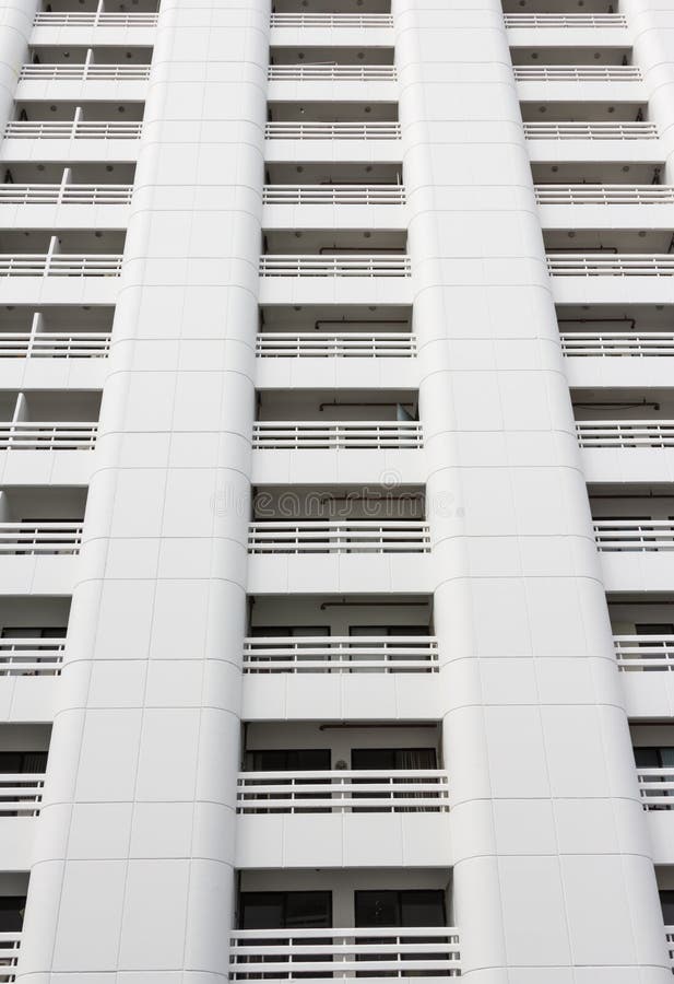 Vertical of Many White Balcony of a Modern Building Stock Photo - Image ...