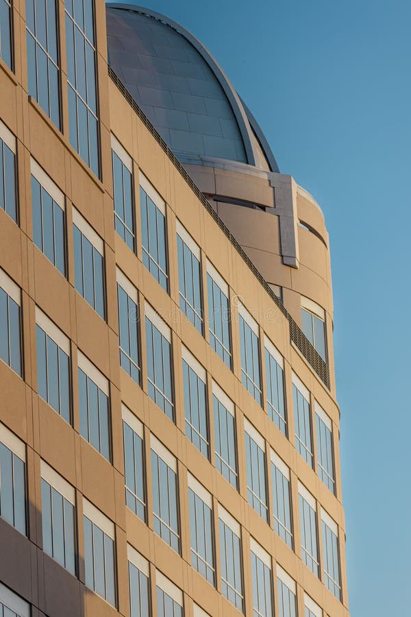 Vertical Minimalistic Shot of a Modern Office Building Exterior with ...