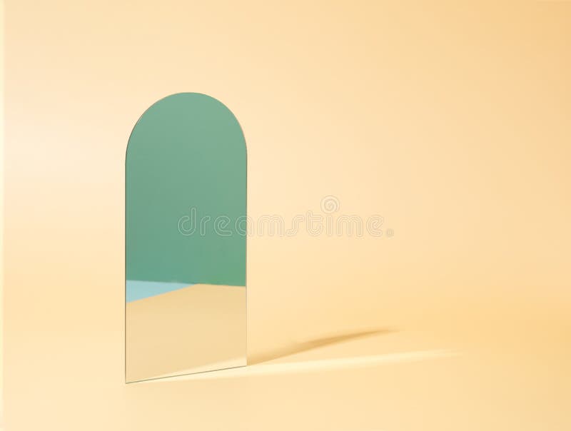 Vertical Mirror on a Pastel Gold Background Reflecting Green Surface ...