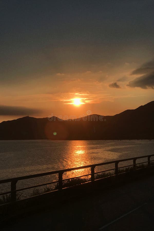 Vertical Mountain, Cloud, Sun and Footpath at Sunset Stock Photo ...
