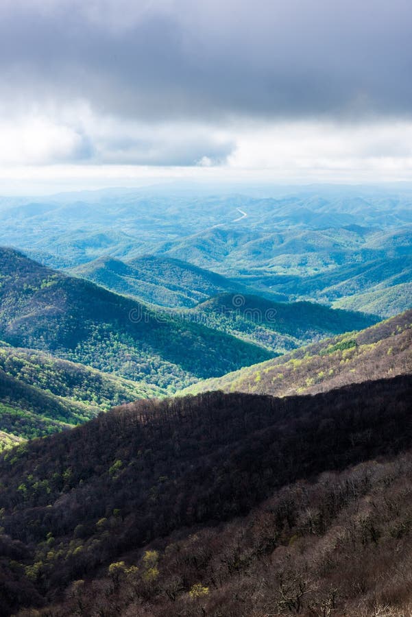 Vertical Mountain View stock image. Image of clouds - 101477415