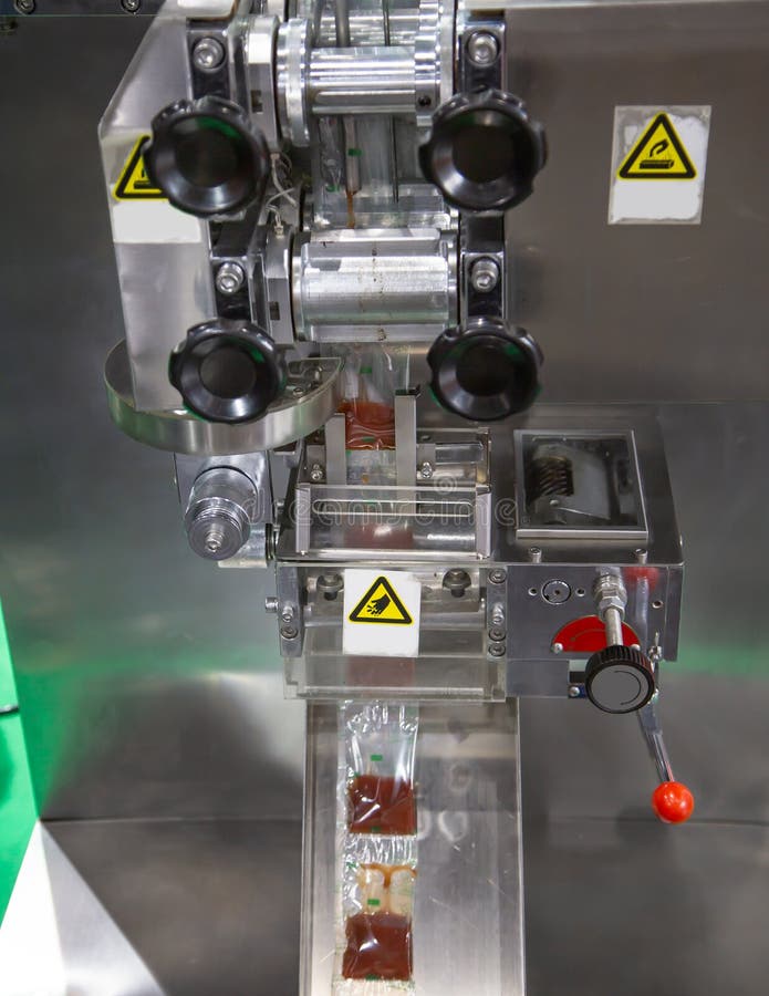 Vertical packaging machine stock image. Image of packing - 142937149