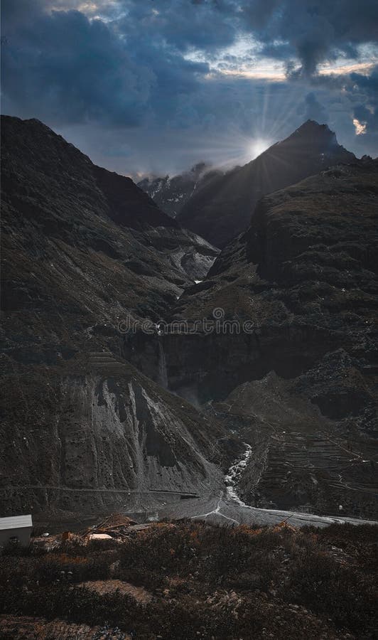 Vertical Panoramic of the Sun Rising Behind Mountains of India and a ...