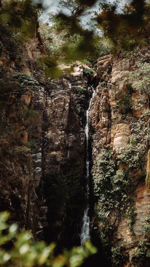 Vertical Panoramic View of an Immense Rough Cliff with a Long Thin ...