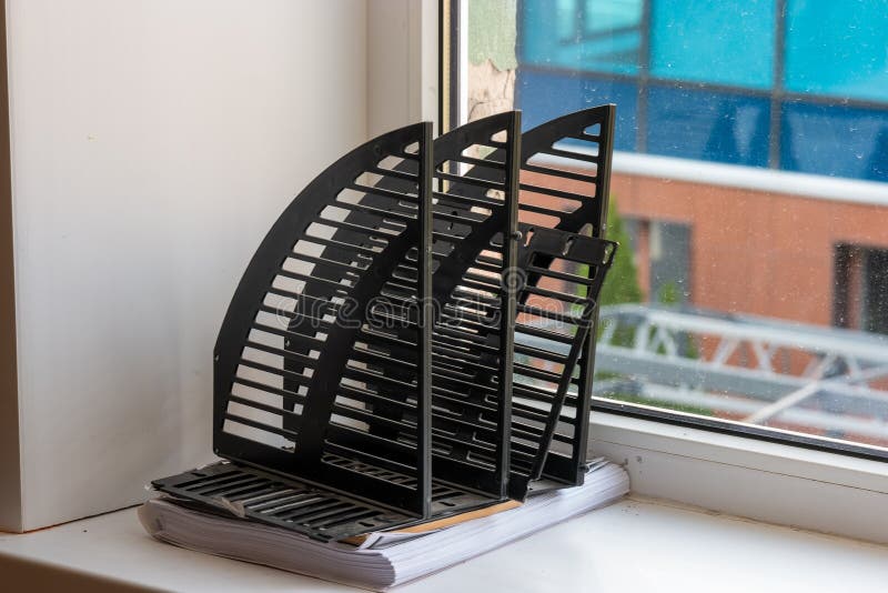 Vertical Paper Trays or Document Holders Empty on Windowsill in Office ...