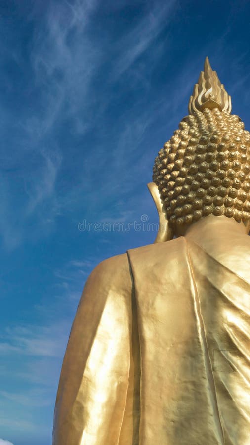 Vertical Partial View of the Behind of Wat Muang Statue before the Blue ...