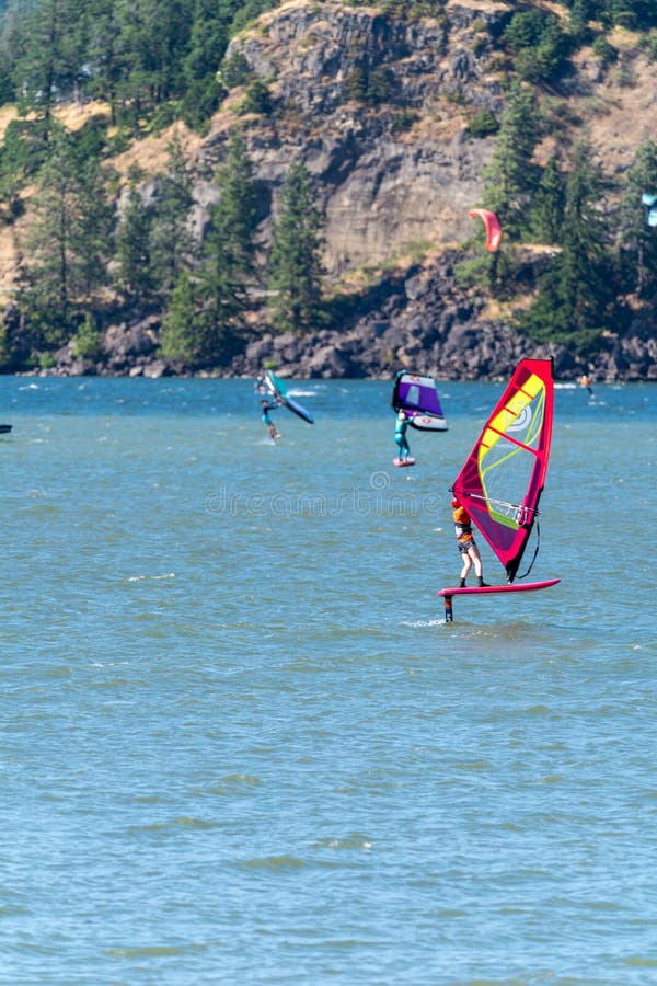 Vertical of People Windsurfing on Waves. Stock Image - Image of ...