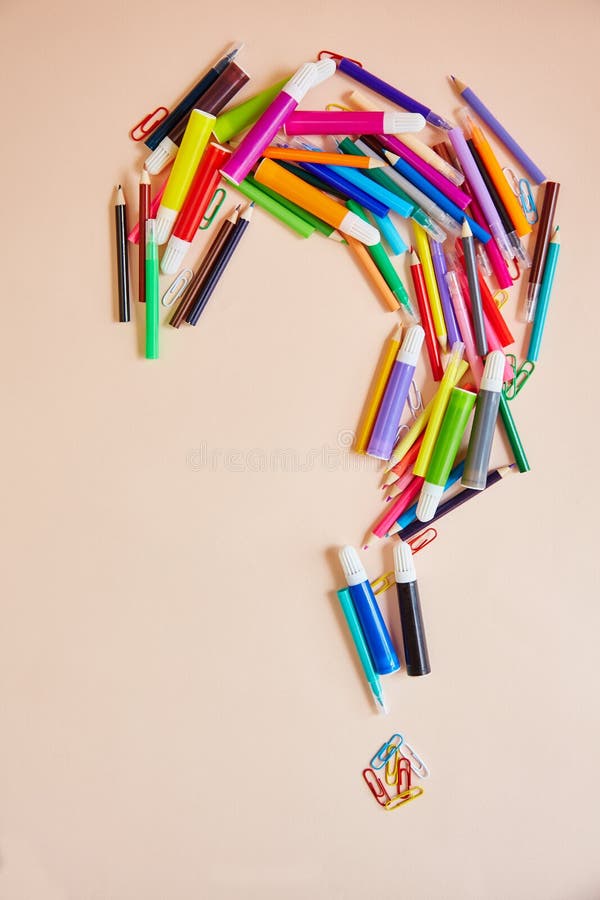 Vertical Photo. Colored Markers and Rainbow-colored Paper Clips Lie on ...