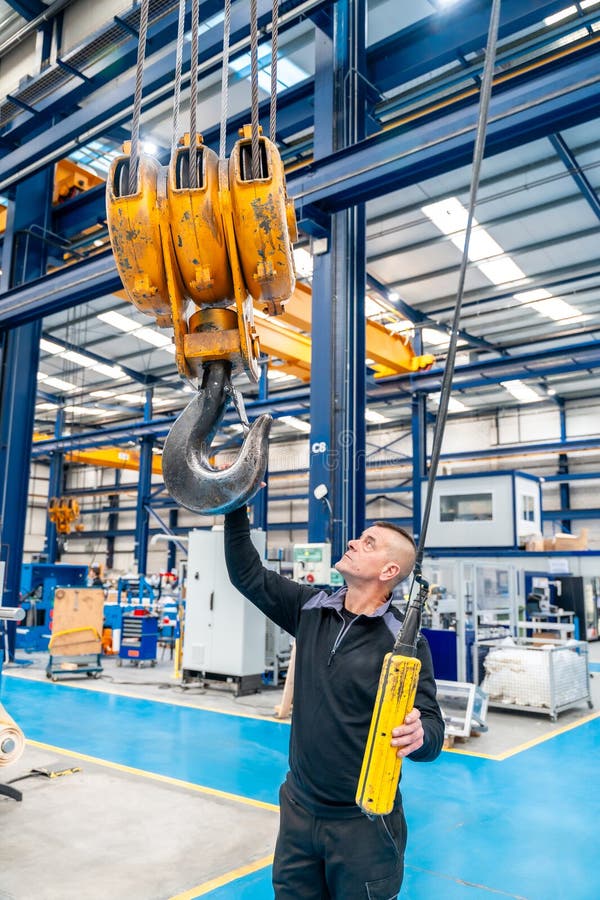 Operator Using an Industrial Crane in a Logistics Factory Stock Image ...