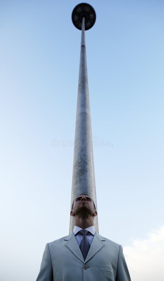 Vertical Photo of Man Against a Column Stock Photo - Image of ...
