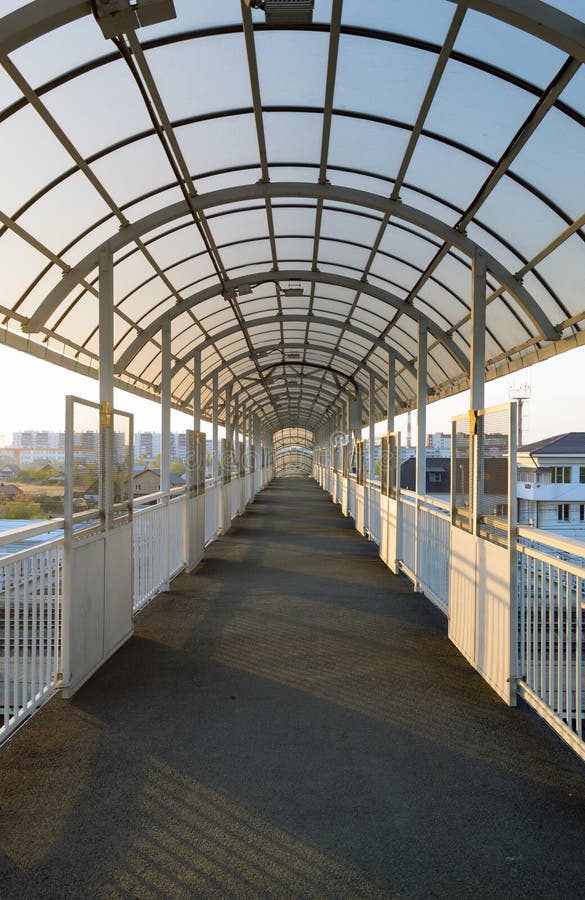 Vertical Photo of a Pedestrian Bridge with Railings and Canopy in ...