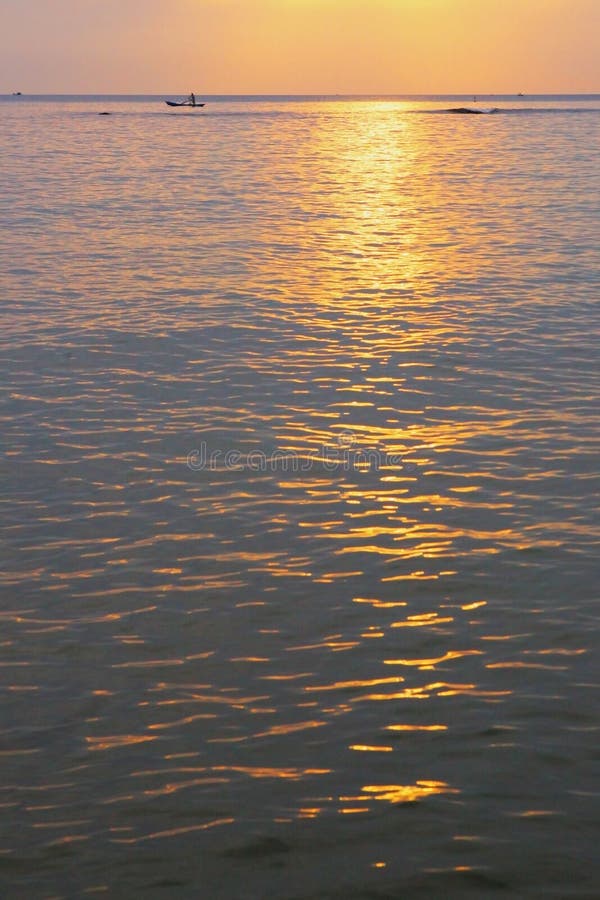 Vertical Photo of Sea Sunset with Little Boat Stock Image - Image of ...