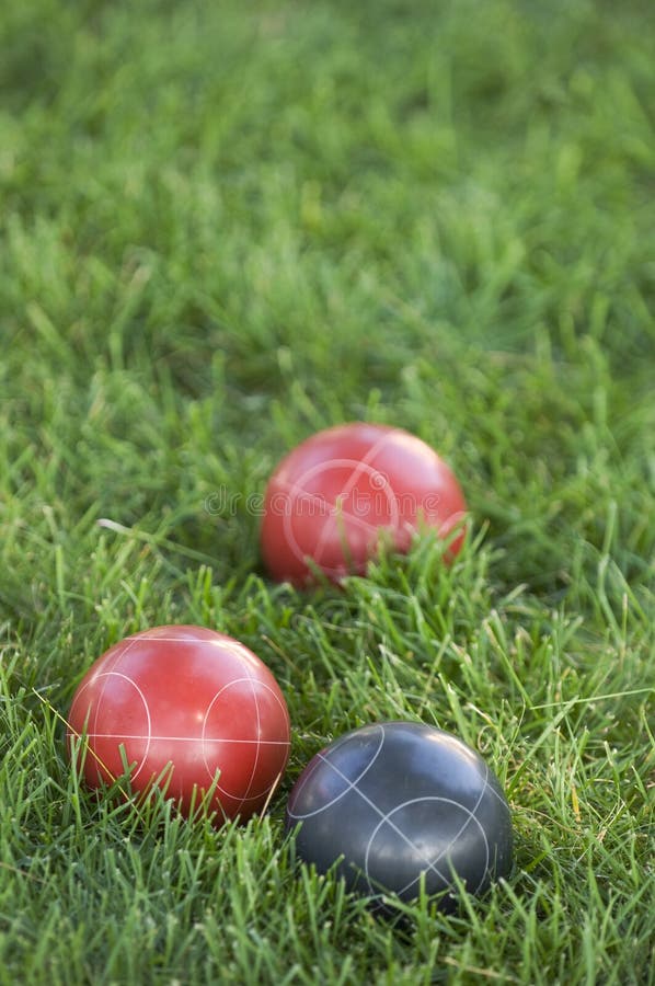 Vertical Picture of Colourful Bocce Balls on the Lawn Under the ...