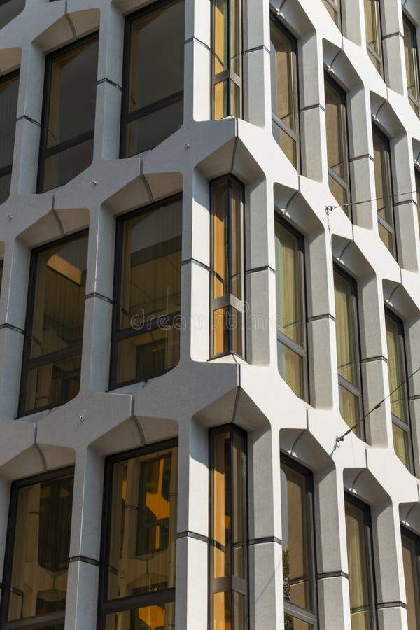 Vertical Picture of a Modern Building with Big Windows Under the ...