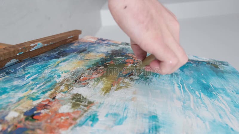 Vertical Placement. the Artist Paints a Abstract Picture in the Studio ...