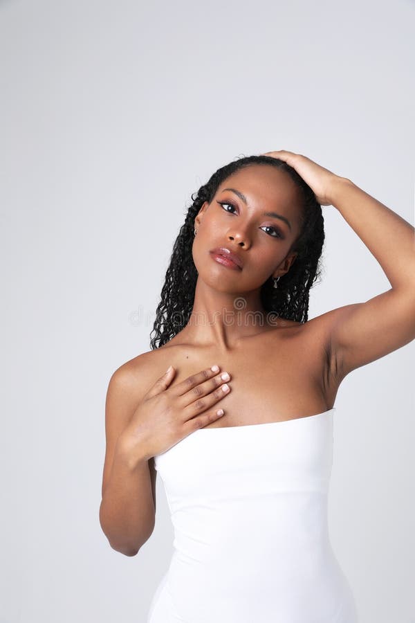 Vertical Portrait Of African American Young Woman Poses Indoor Beauty