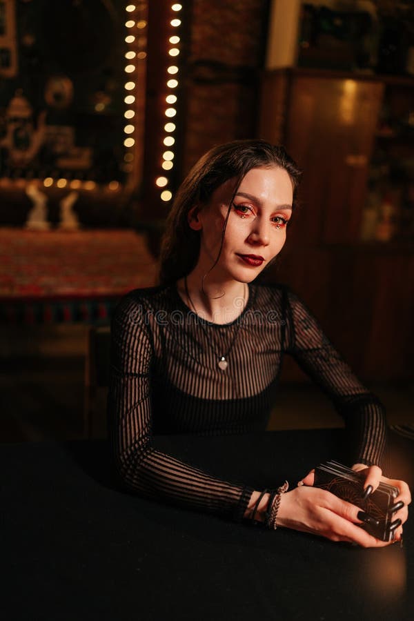 Vertical Portrait of Fortune Teller Female Looking at Camera, Shuffles ...